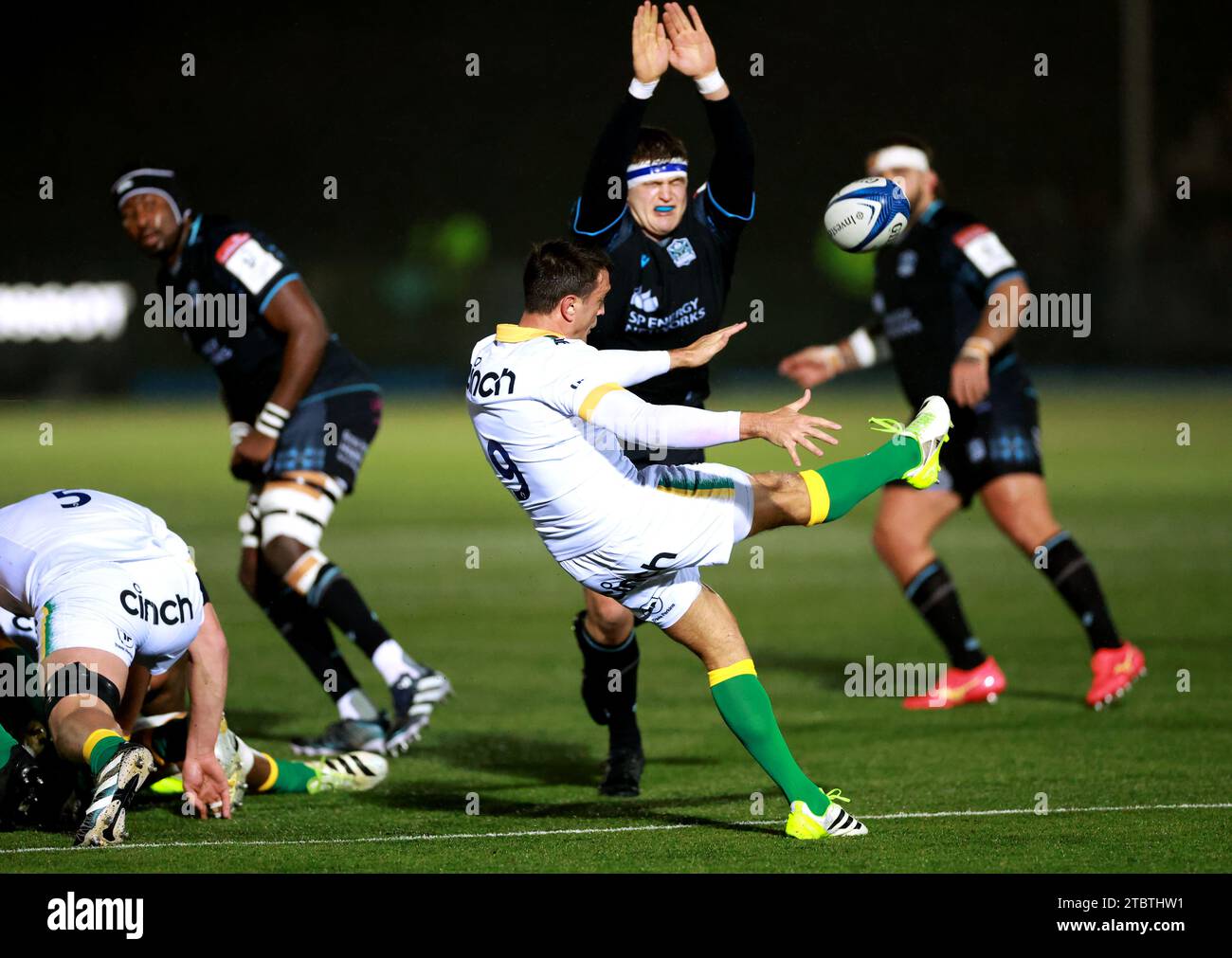 Northampton Saints' Alexander Mitchell kicks the ball under pressure ...