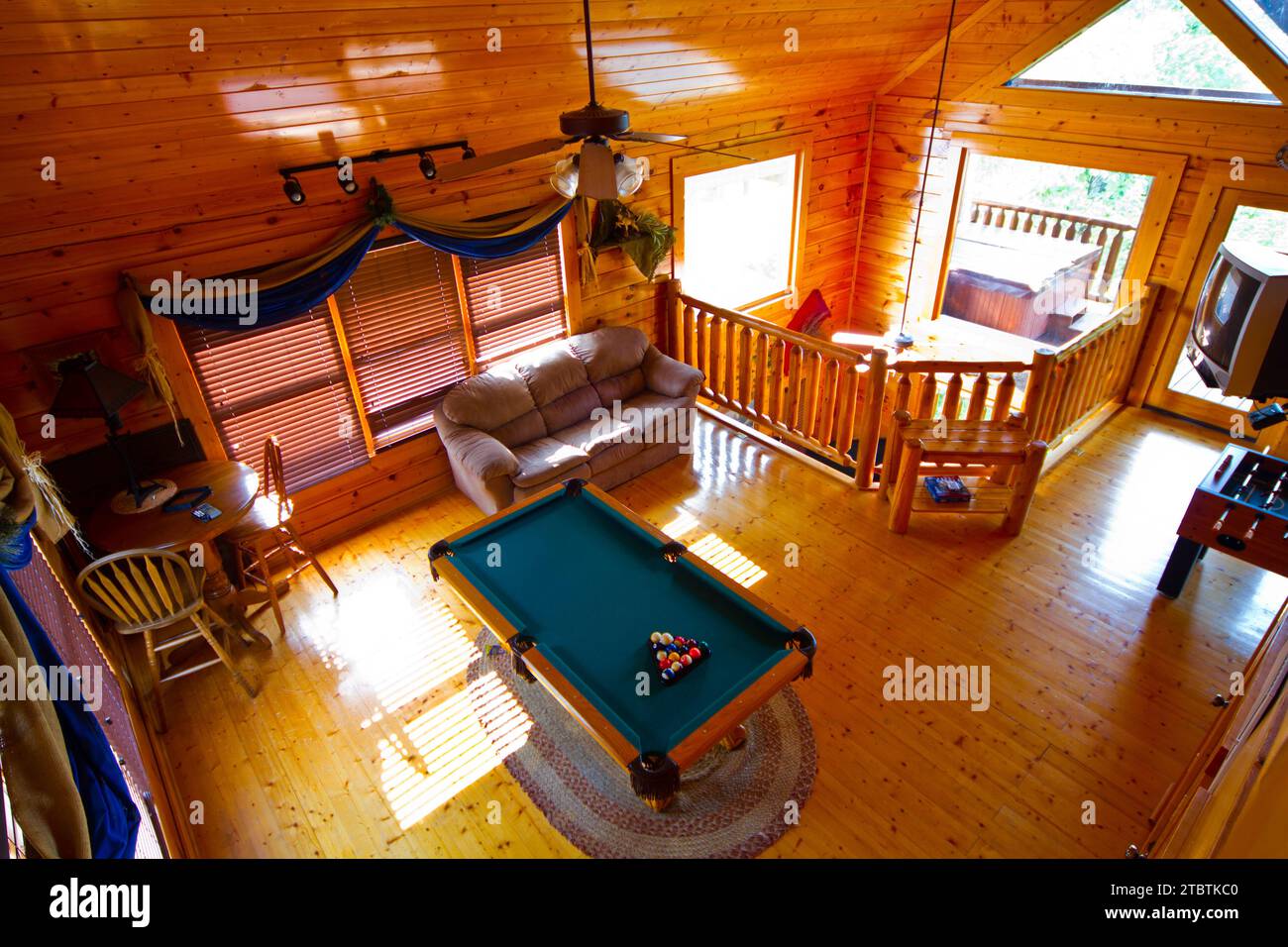 Sunlit Rustic Cabin Interior with Pool Table and Loft View, Gatlinburg ...
