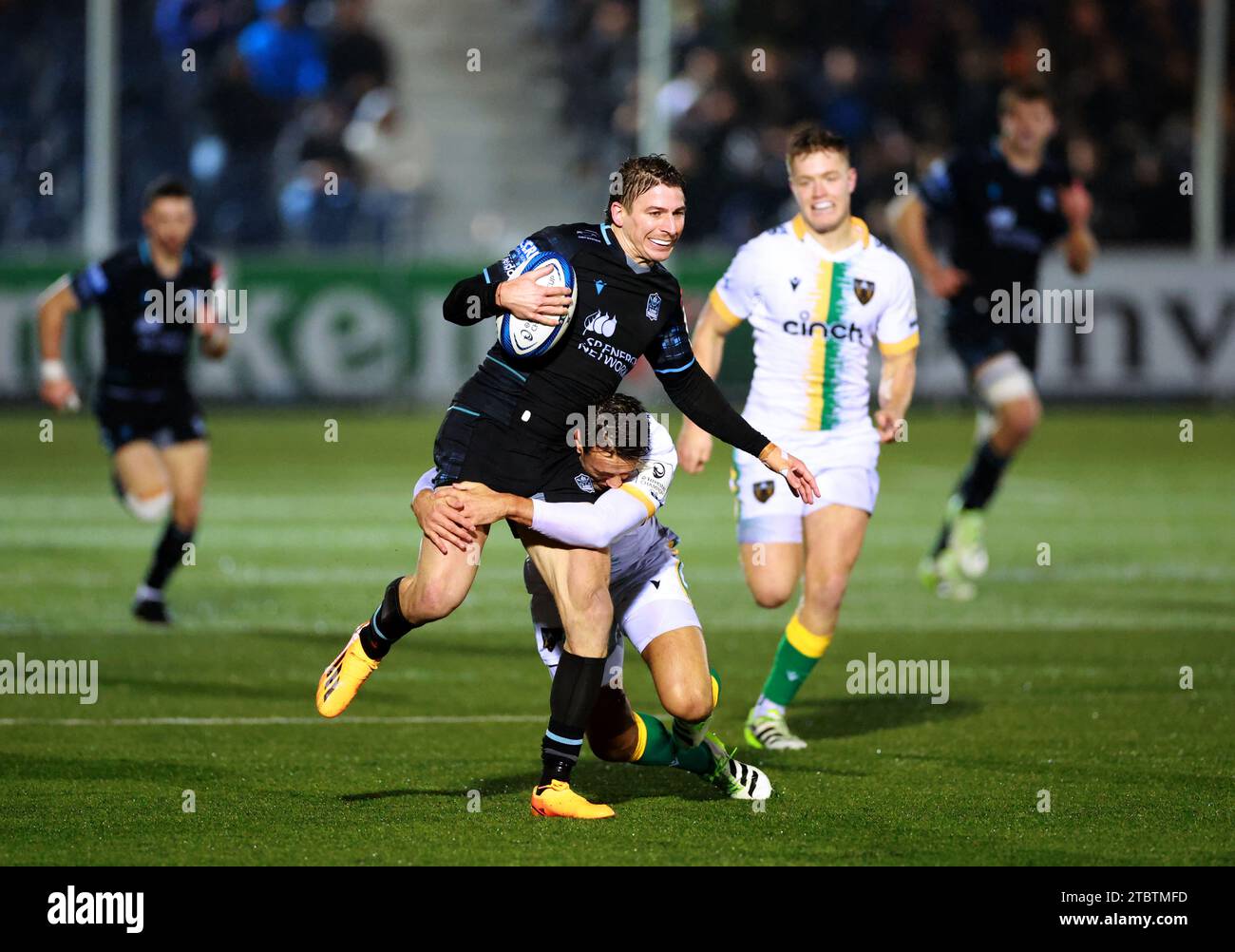 Glasgow Warriors' Sebastian Cancelliere is tackled by Northampton ...