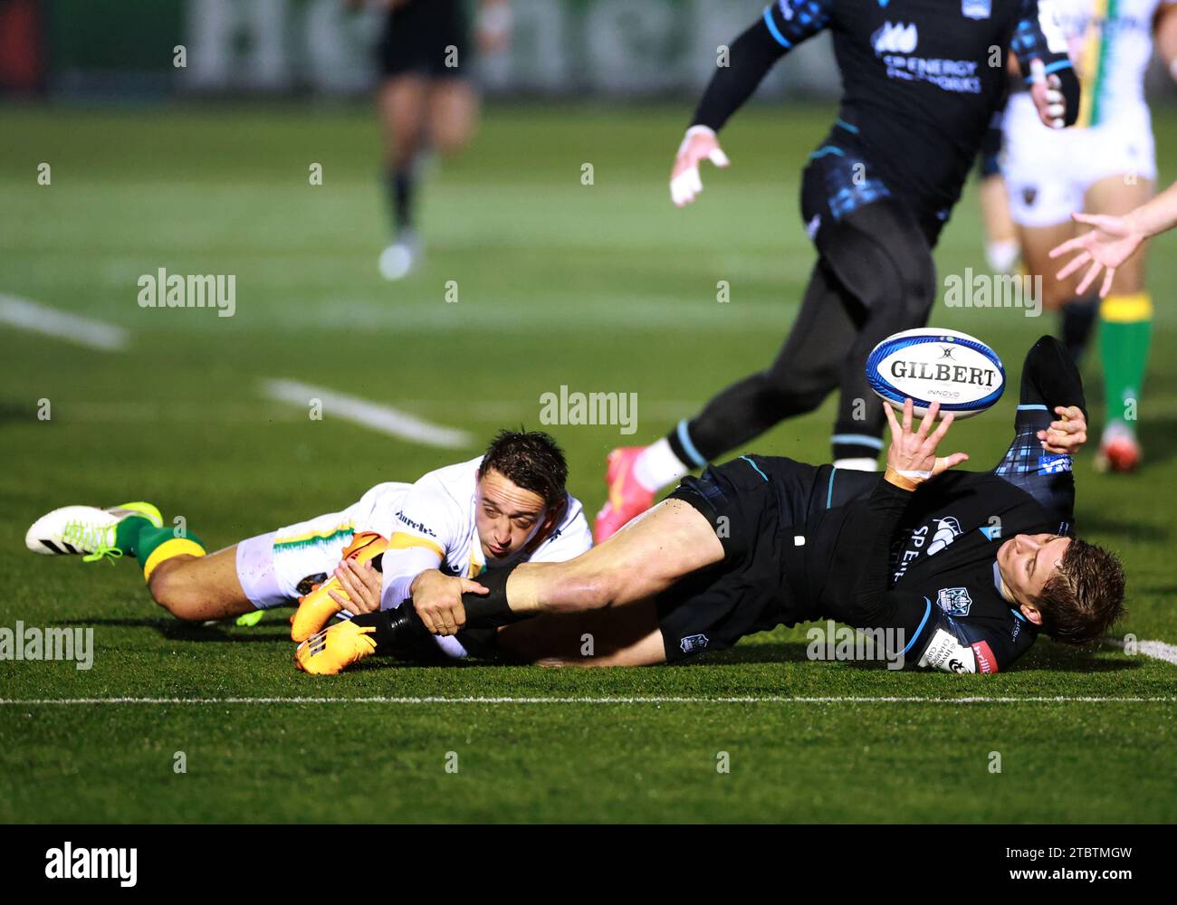 Glasgow Warriors' Sebastian Cancelliere is tackled by Northampton ...