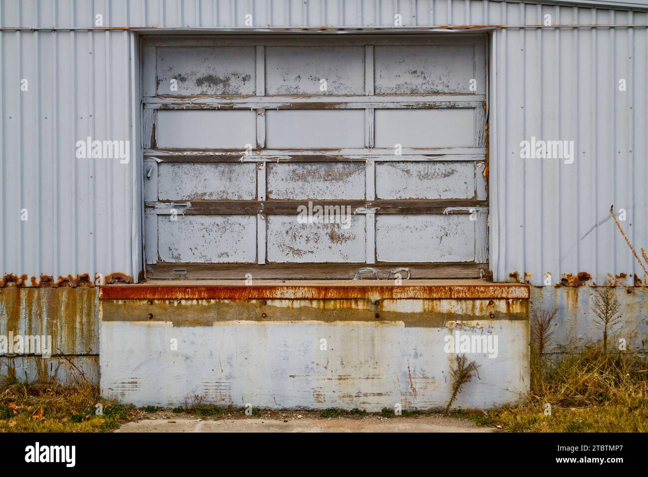 Rustic Weathered Garage Door on Aged Industrial Metal Wall in Warsaw ...