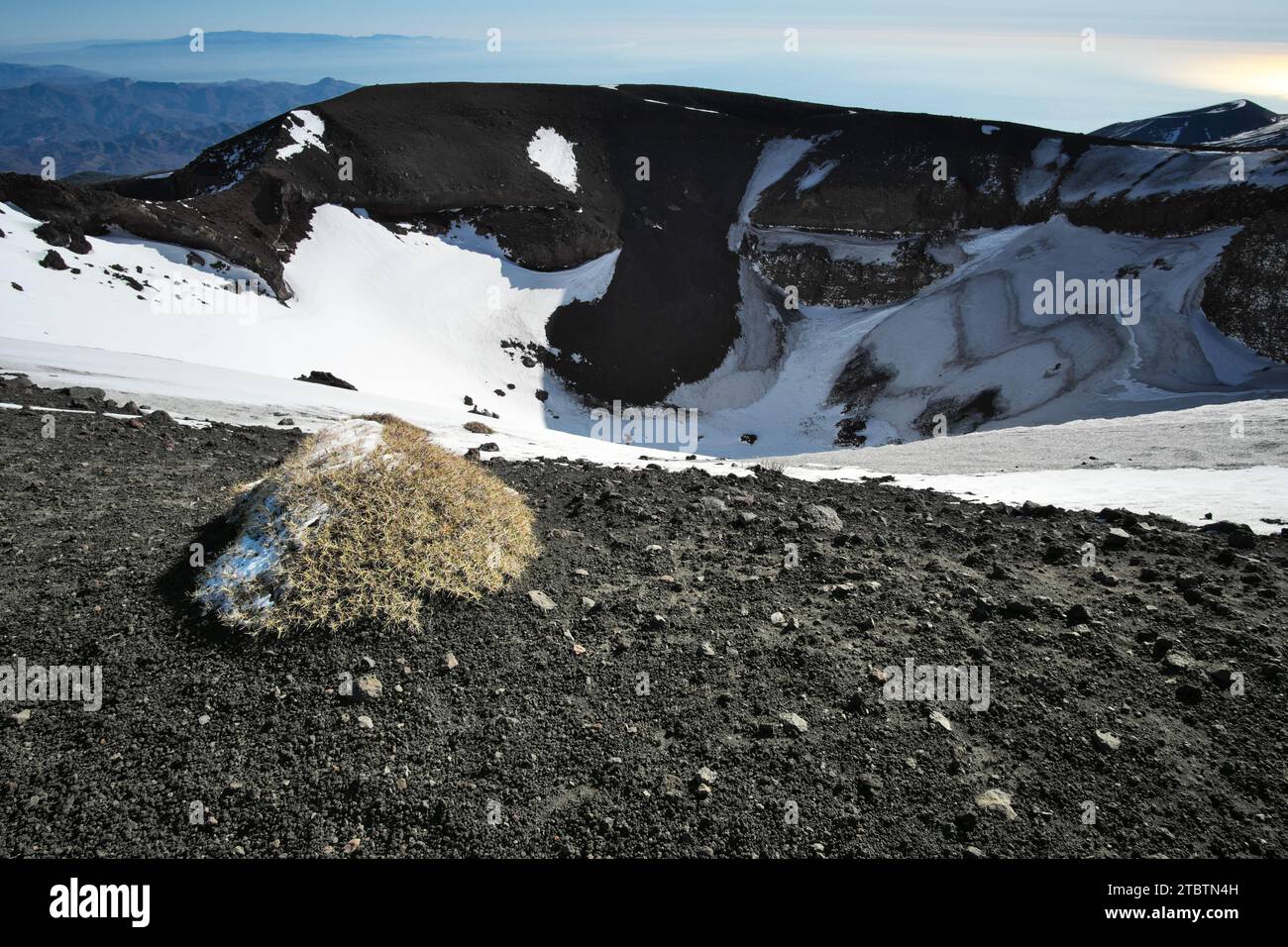 inactive crater in snowy mountainside of Mount Etna North-East Crater ...