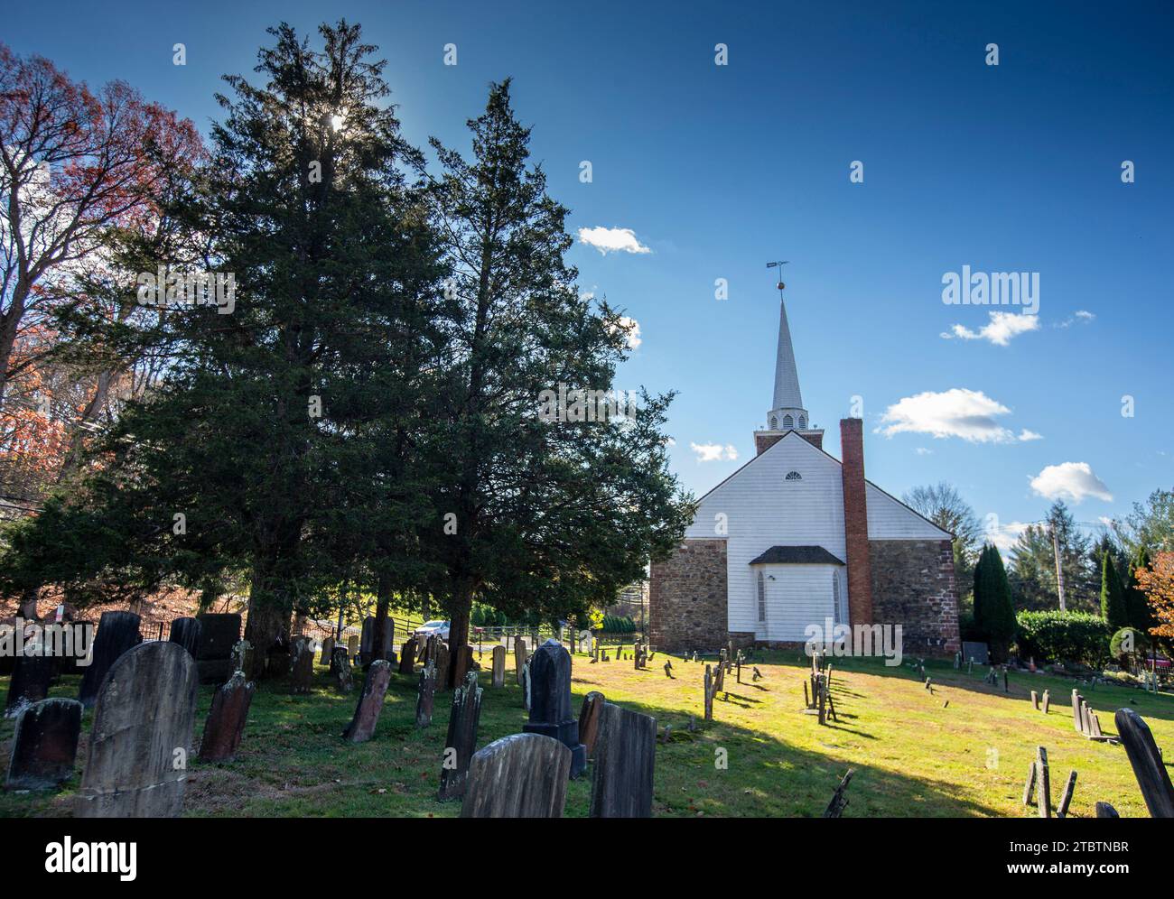 Old cemetery with historic Old Stone Church in the background Stock ...