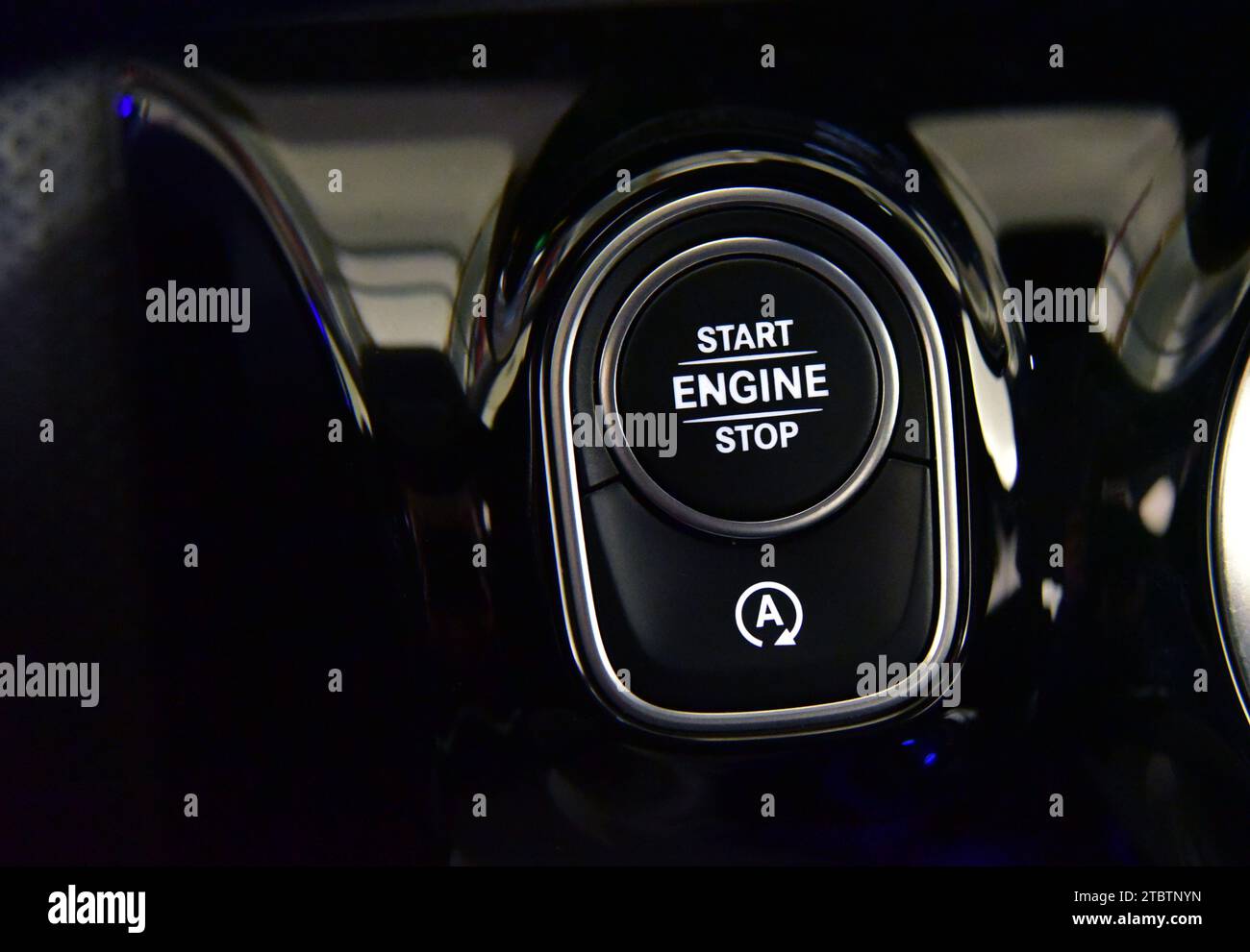 Start stop engine button on a modern car dashboard Stock Photo - Alamy