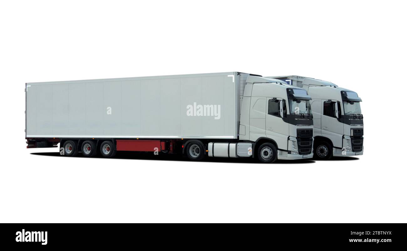Two large trucks with semi trailer on a white background Stock Photo ...