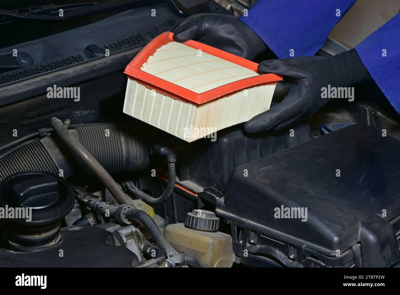 Replacement of air filter Stock Photo - Alamy