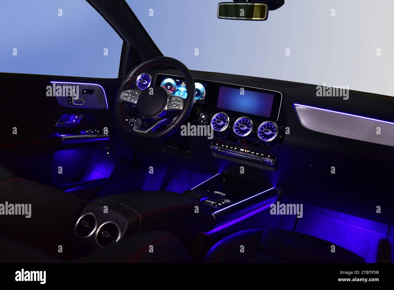 Interior luxury passenger car with blue light in dark Stock Photo - Alamy