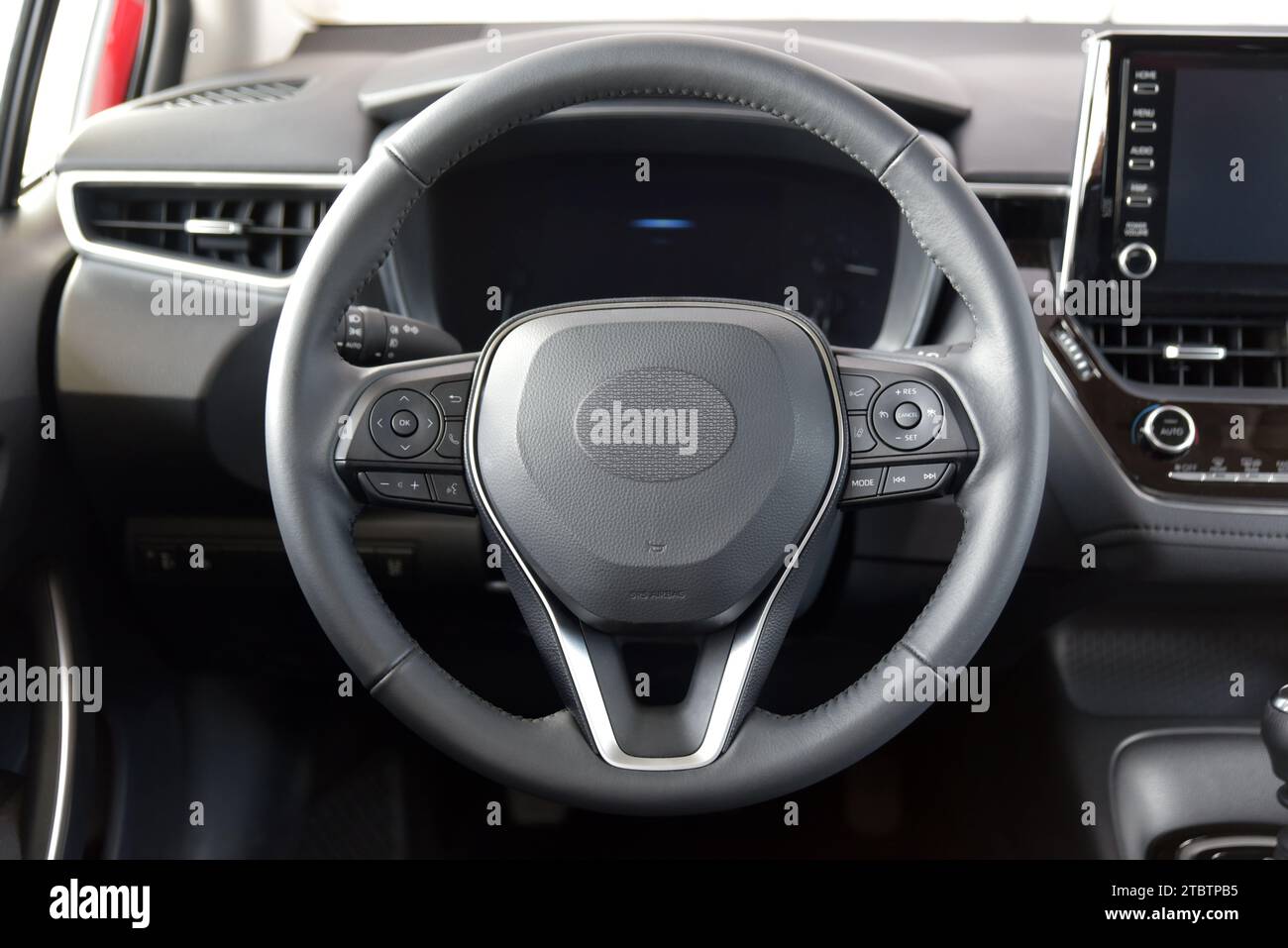 Steering wheel in the new modern car Stock Photo - Alamy