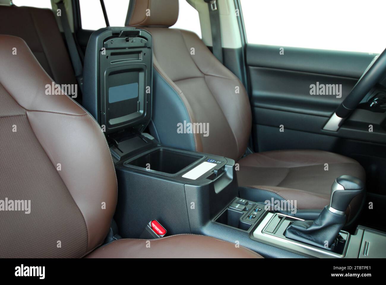 Open storage box between front car seats Stock Photo - Alamy