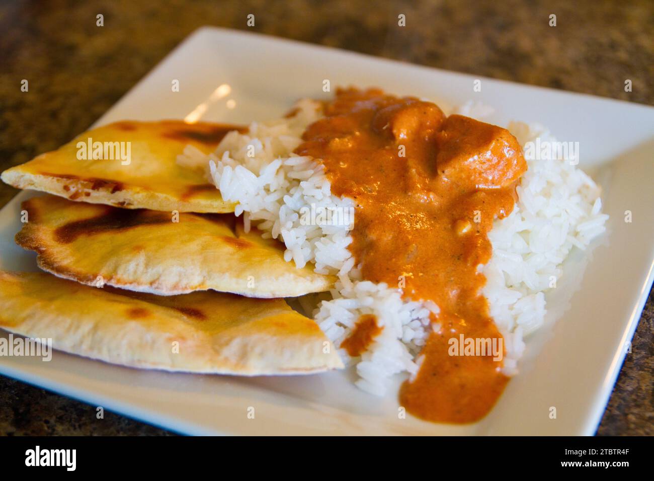 Inviting Plate of Traditional Indian Cuisine with Curry, Rice and Naan ...