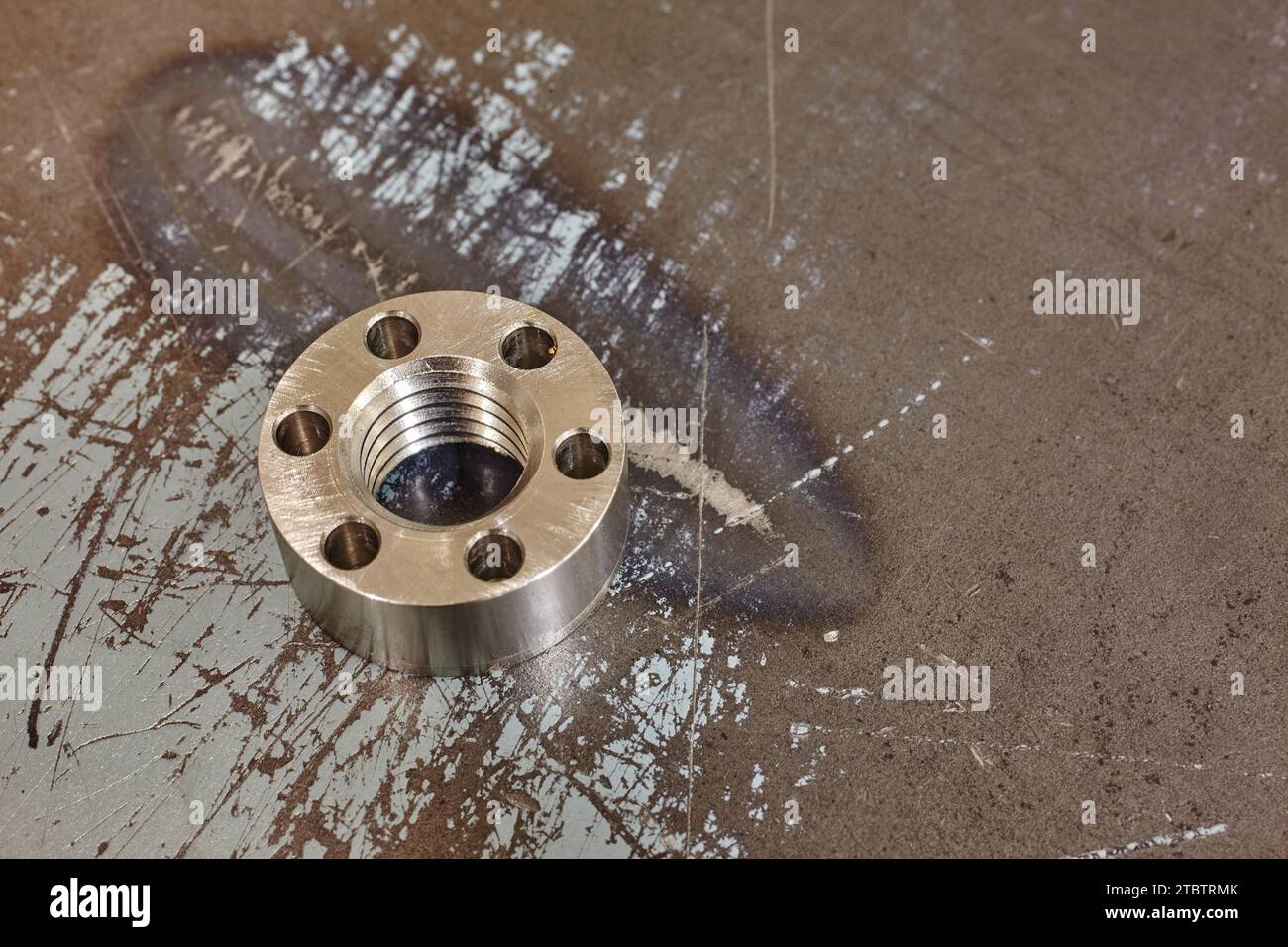 Machined Metal Flange on Industrial Workshop Surface in Close-Up View ...
