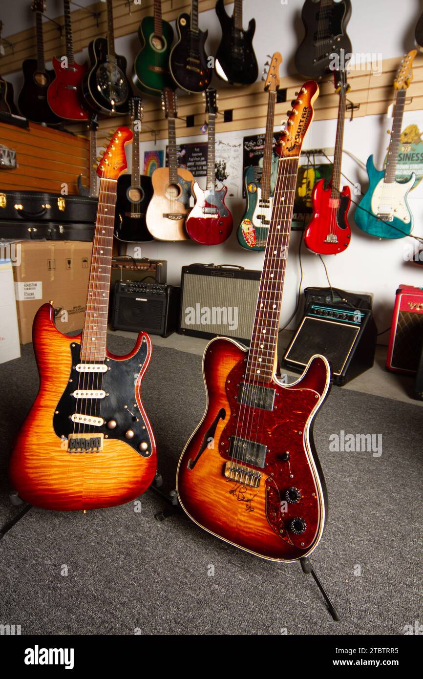 Electric Guitars in Vibrant Music Shop - Low Angle View Stock Photo - Alamy