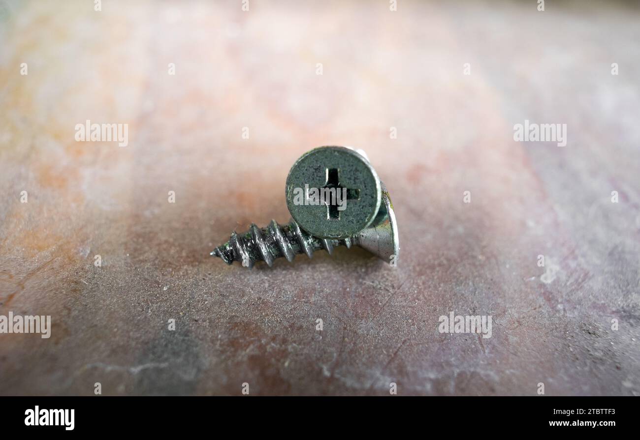group of gray screws, stacked Stock Photo - Alamy