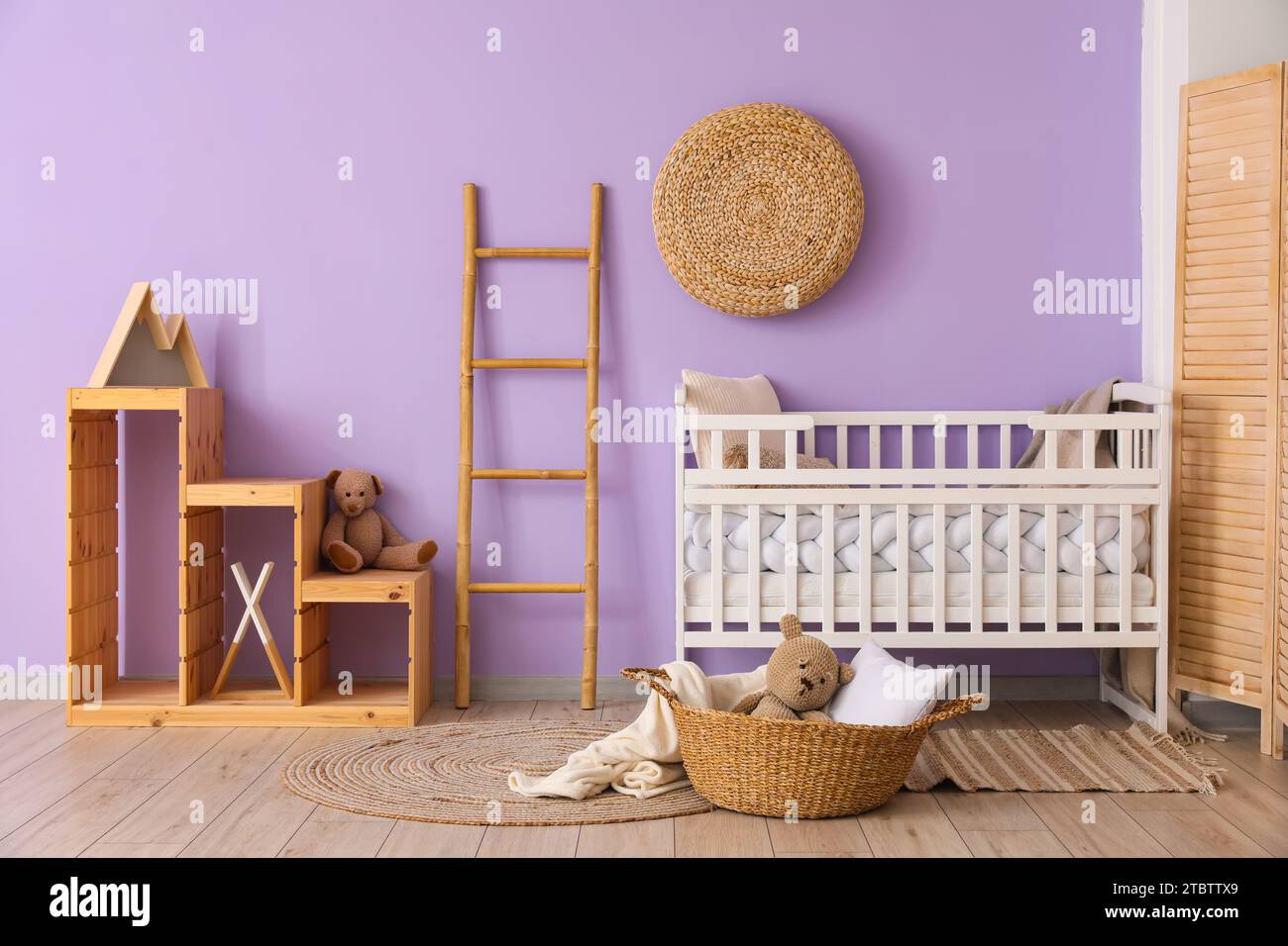 Interior of children's room with crib, ladder and shelves Stock Photo ...