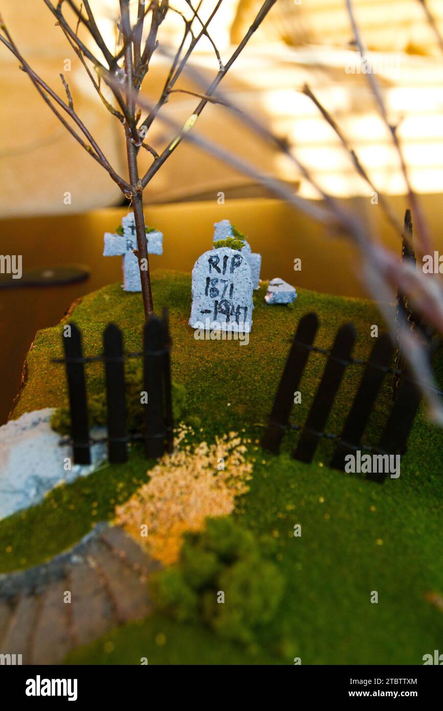 Miniature Graveyard Scene with Focus on Headstone and Fence Stock Photo ...