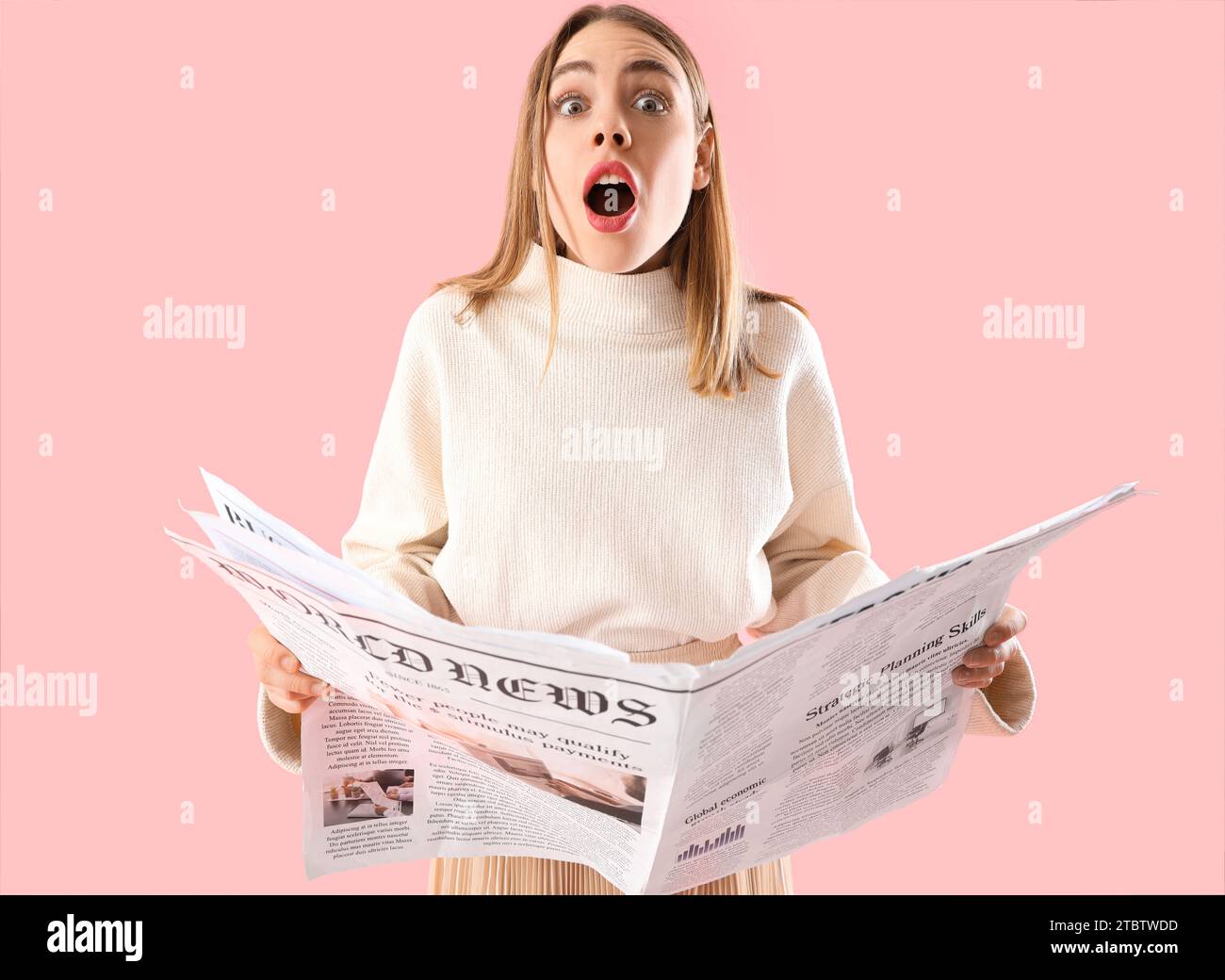 Beautiful shocked young woman reading newspaper on pink background ...