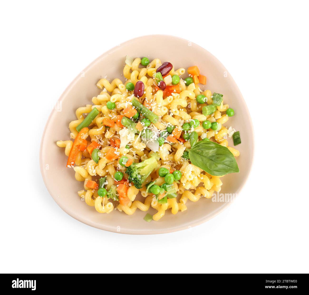 Plate with tasty pasta primavera on white background Stock Photo - Alamy