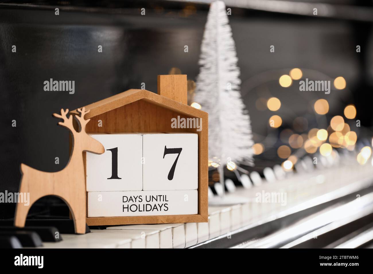 Calendar with text 17 DAYS UNTIL HOLIDAYS and Christmas decorations on ...