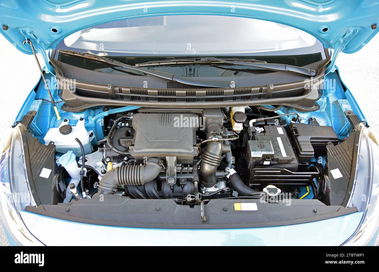 A gasoline engine in a small passenger car Stock Photo - Alamy