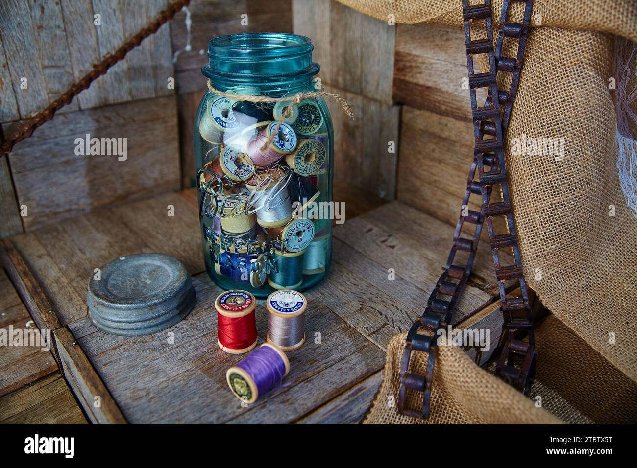 Vintage Sewing Theme with Teal Mason Jar and Rustic Chains in Craft ...
