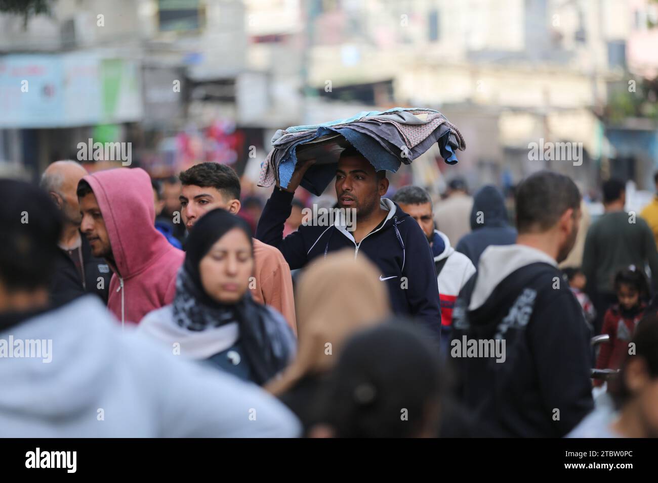 Maghazi Refugee Camp. 8th Dec, 2023. People are seen on a street in ...