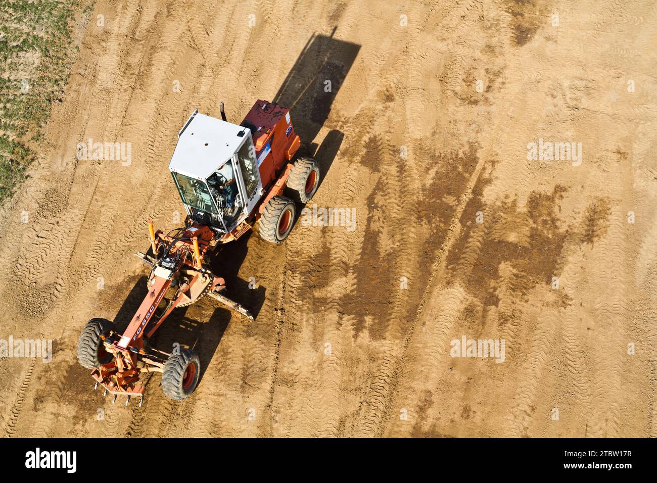 Aerial View of Red Tractor Tilling Dry Soil in Rural Kentucky Stock ...