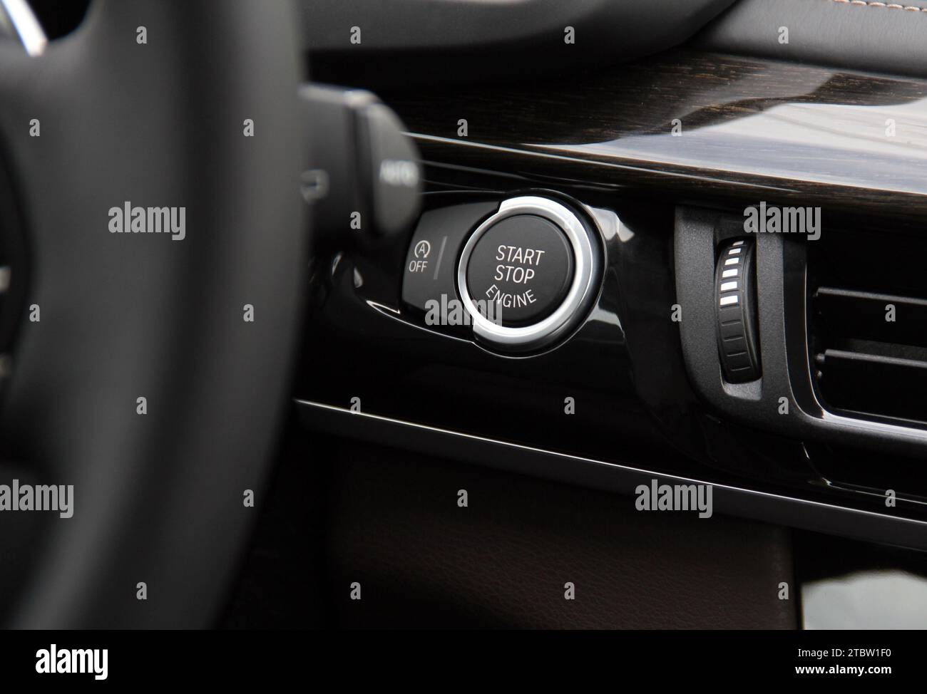 Start stop engine button on a modern car dashboard Stock Photo - Alamy