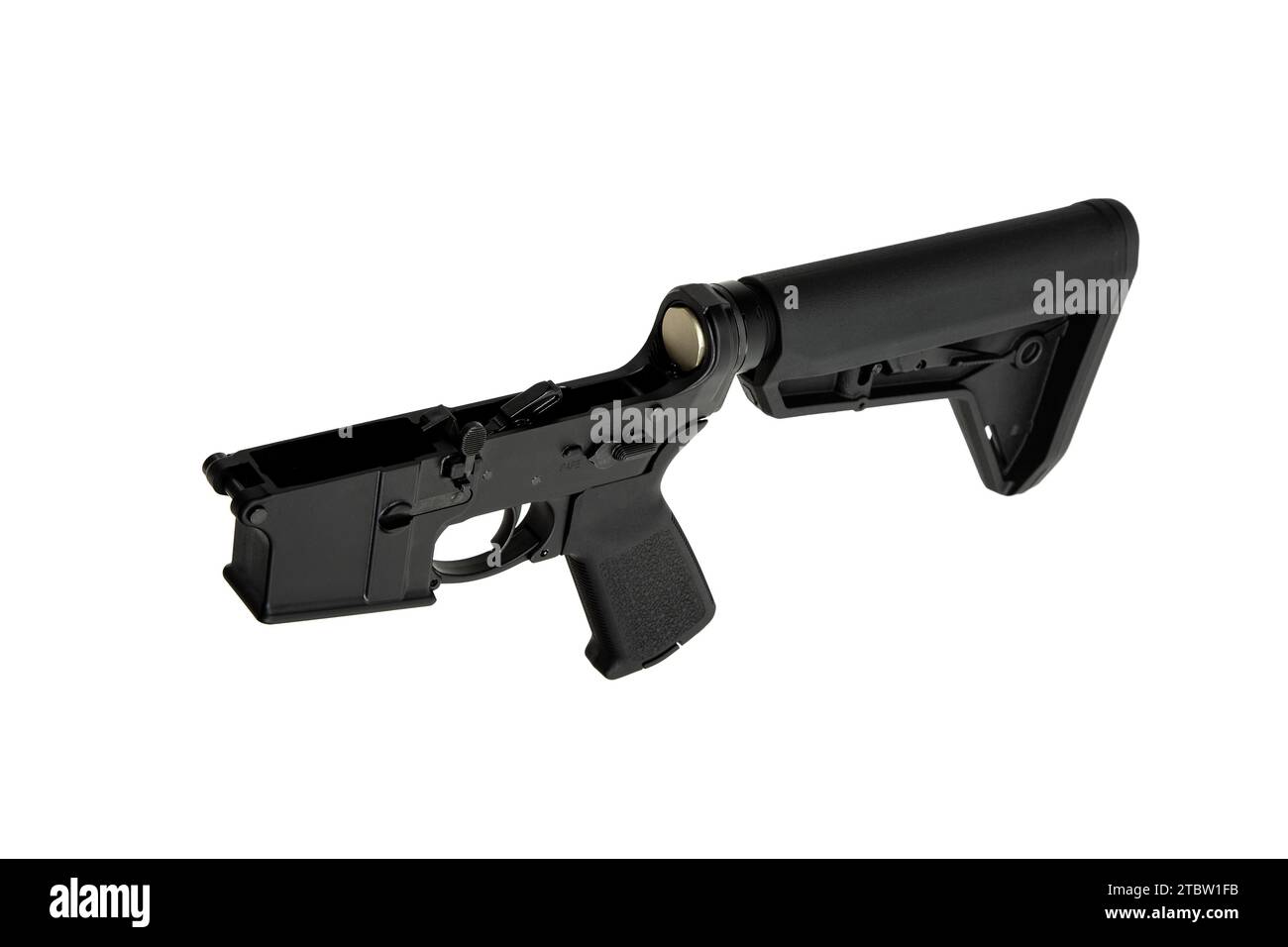 AR15 lower receiver iand buffer spring. Bottom half of a modern assault ...