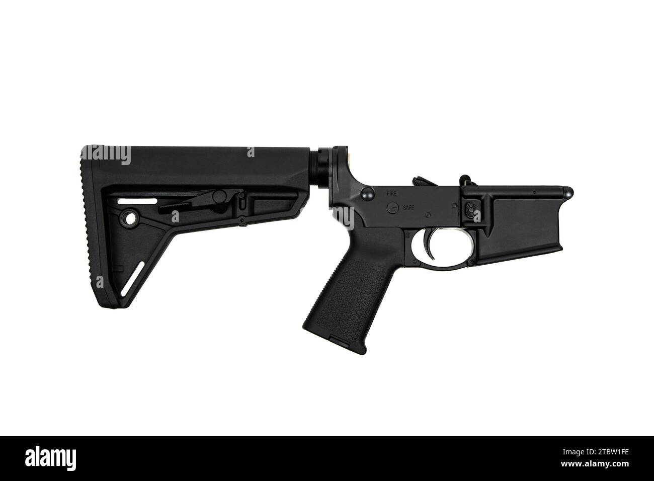 AR15 lower receiver iand buffer spring. Bottom half of a modern assault ...