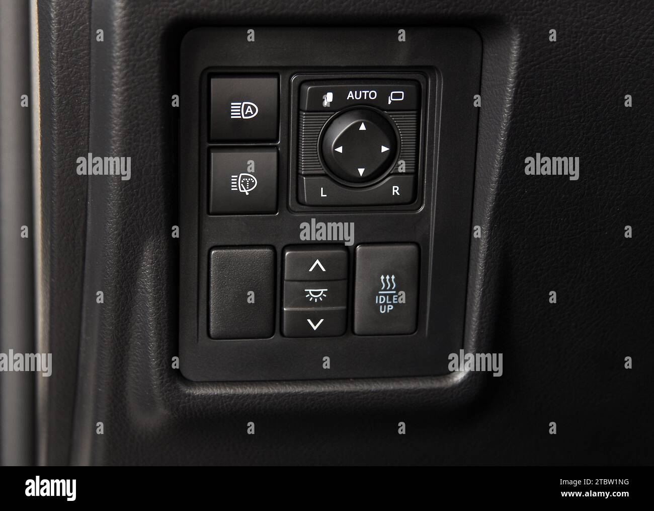 Car switch panel. Side mirror switch. Light switch Stock Photo - Alamy