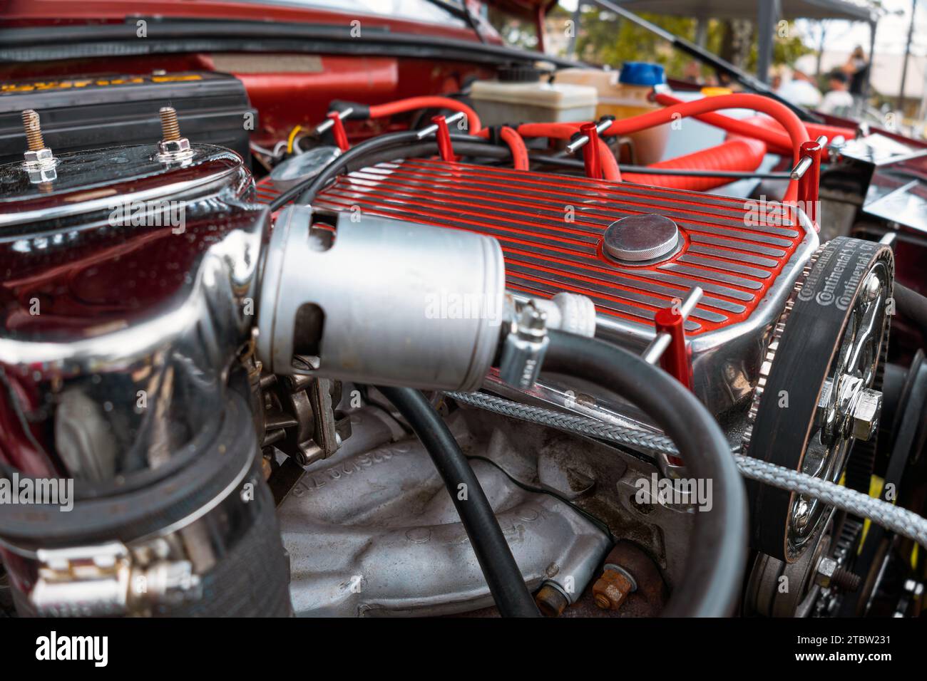 Detail of the engine of a restored car on display at a vintage car fair ...