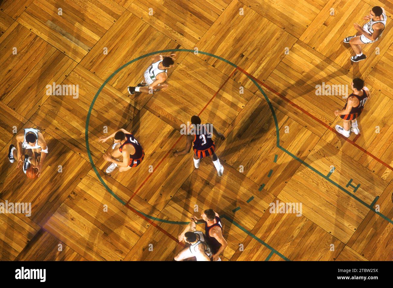 BOSTON, MA - DECEMBER 12: Bob Cousy #14 of the Boston Celtics dribbles ...