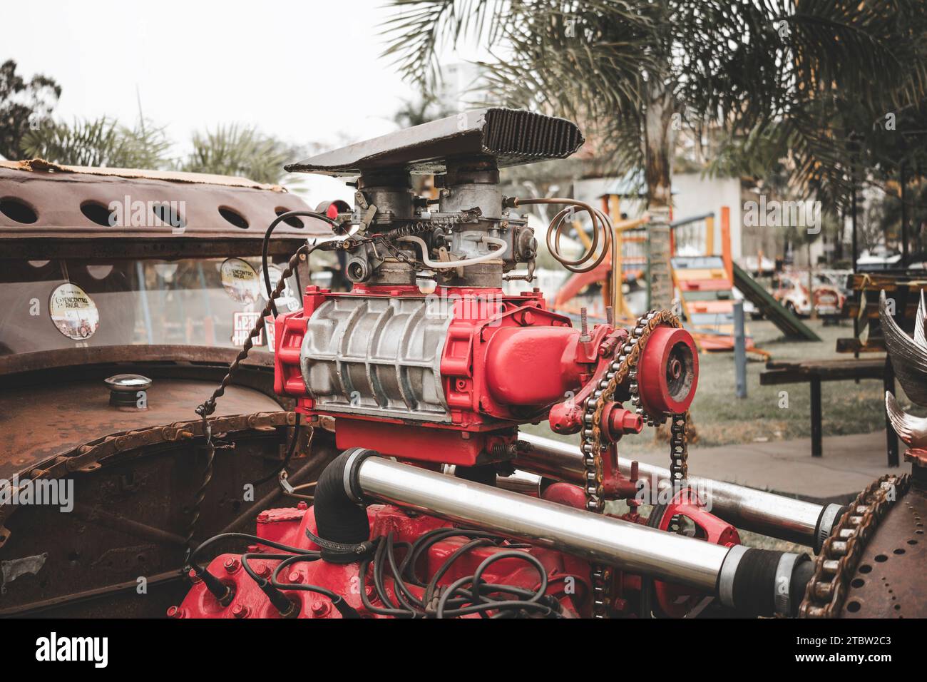 Detail of Engine details of an old custom Ford muscle car on display at ...