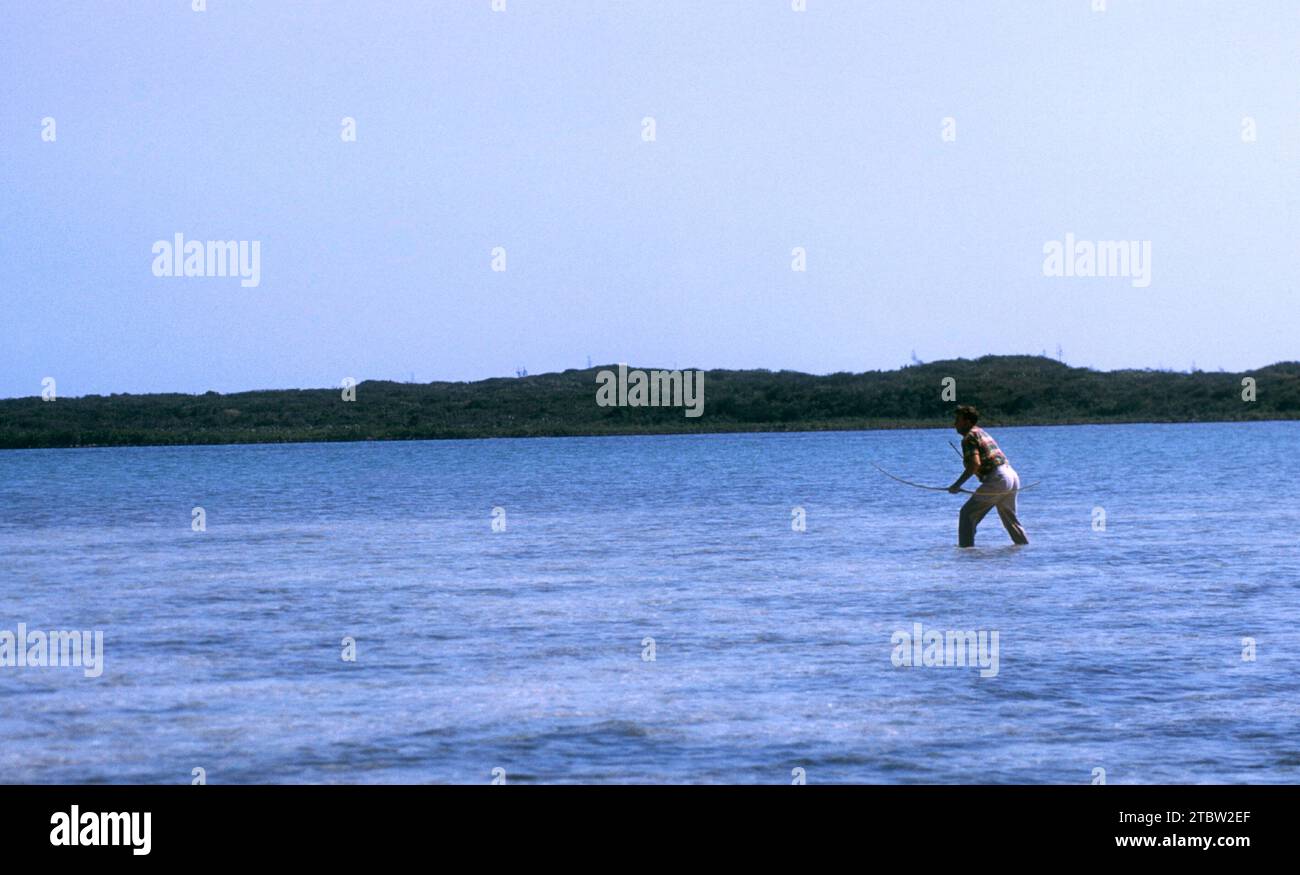 BAHAMAS - APRIL 7: Colyn Rees gets ready to load his bow and arrow ...