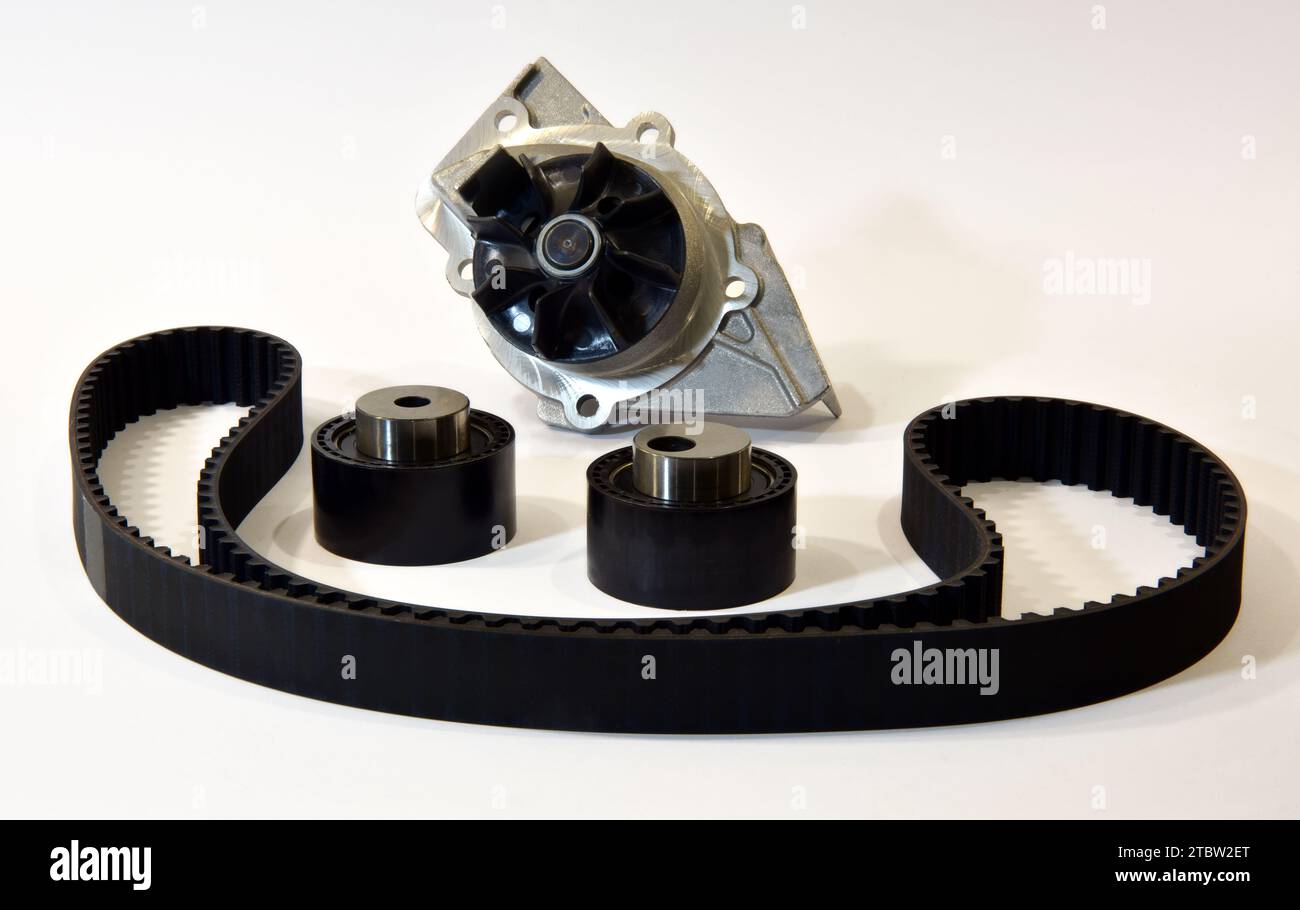 Car engine timing belt, two rollers and water pump. Car engine spare ...