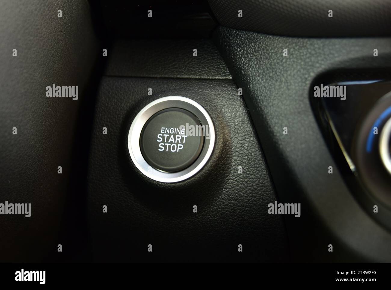 Start stop engine button on a modern car dashboard Stock Photo - Alamy