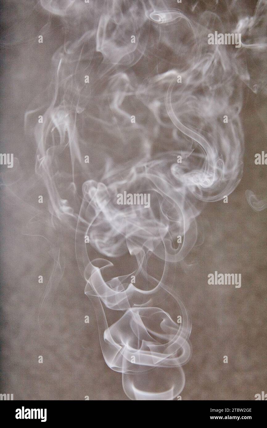 Ethereal Dance of Incense Smoke in High Speed Capture Stock Photo - Alamy
