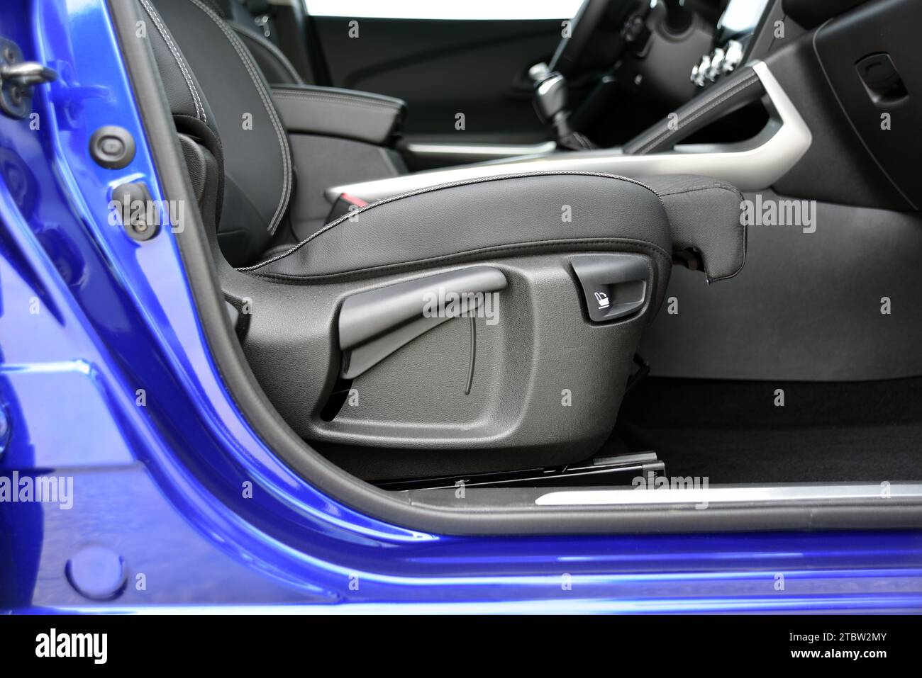 Lever for adjusting the seat position Stock Photo - Alamy