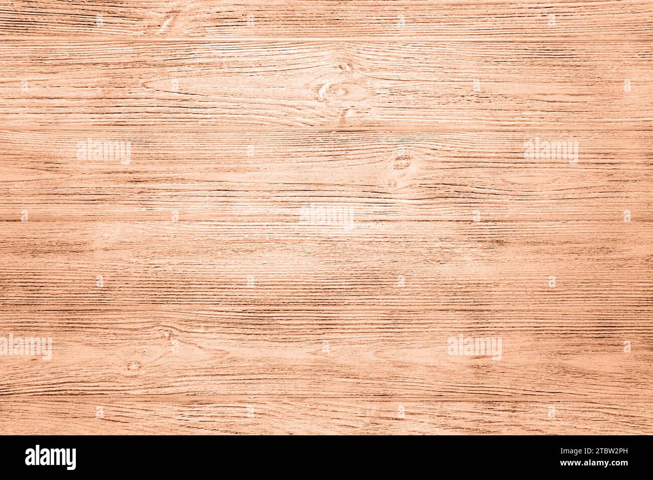 Color of the Year 2024 Peach Fluff Wooden background with veined plank ...