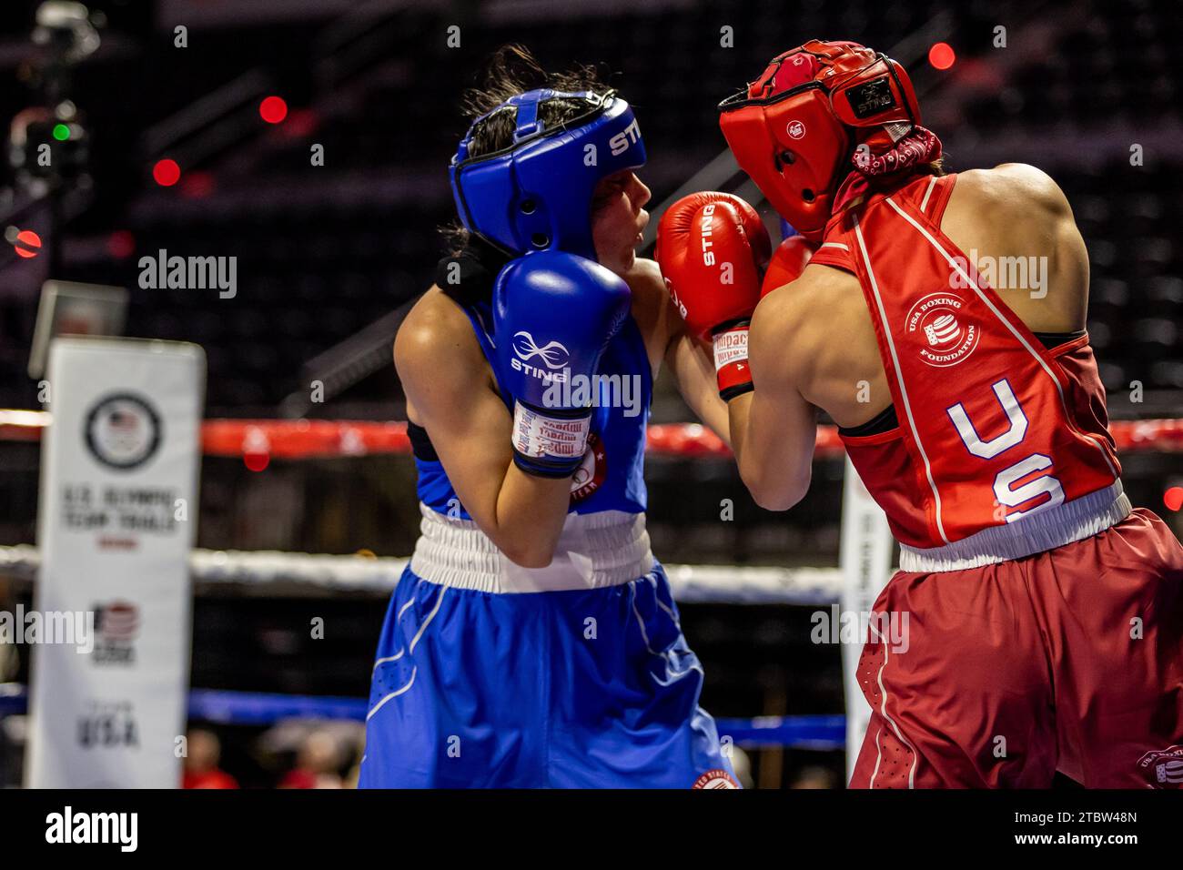 Chantel Navarro (blue) and Yoseline Perez (red) fight during the ...