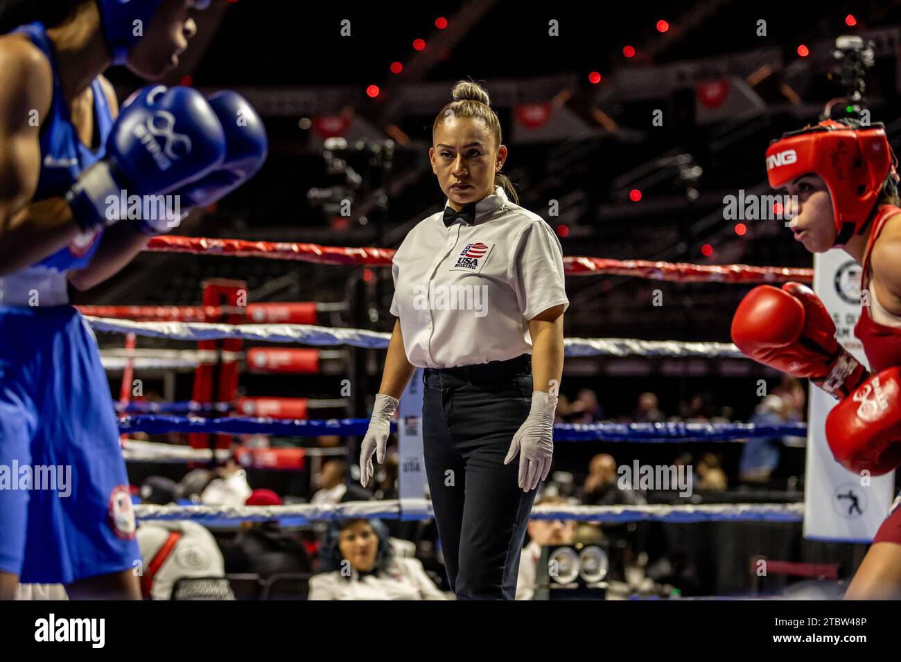 Referee Kathy Rivera officiates the bout betweek Gomez and Prospers in ...