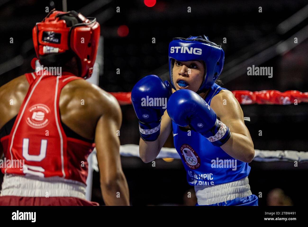 Jewry Rodriguez (blue) looks for an opening against Jasmine Hampton ...