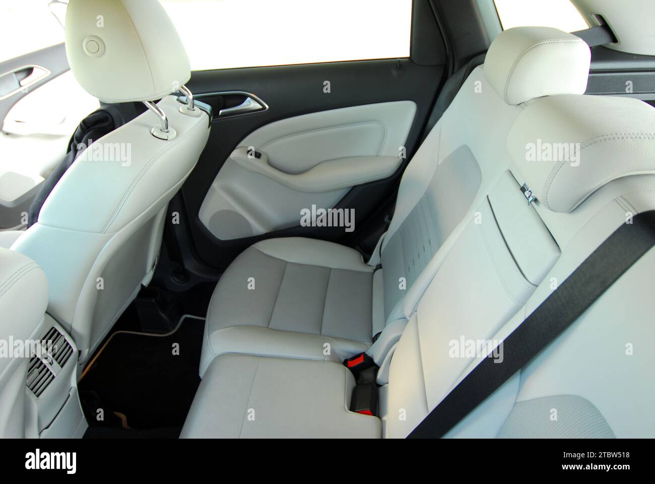 The white rear seat of a luxury passenger car Stock Photo - Alamy