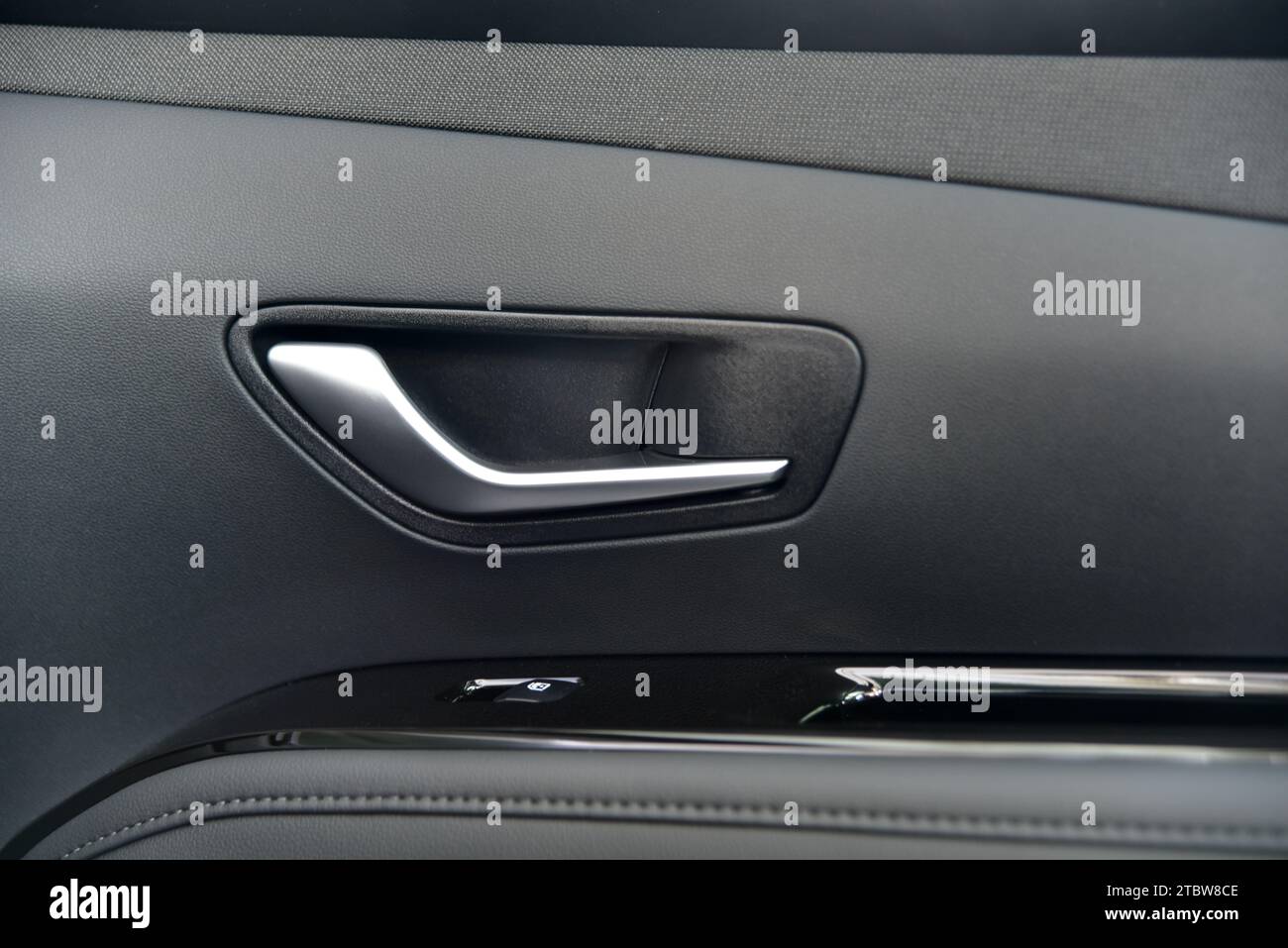 A handle to open on the inside of the car door Stock Photo - Alamy