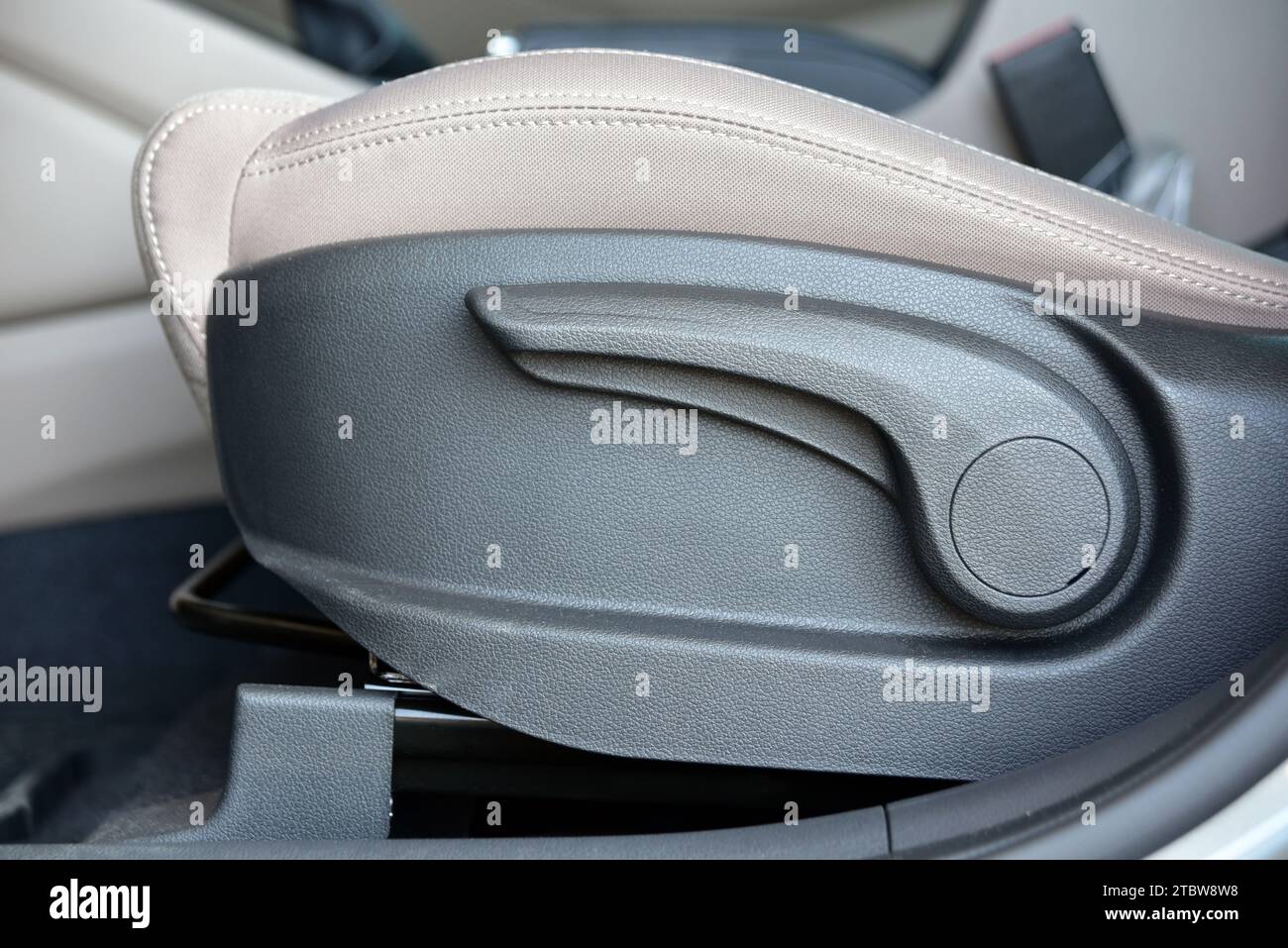 Lever for adjusting the seat position Stock Photo - Alamy