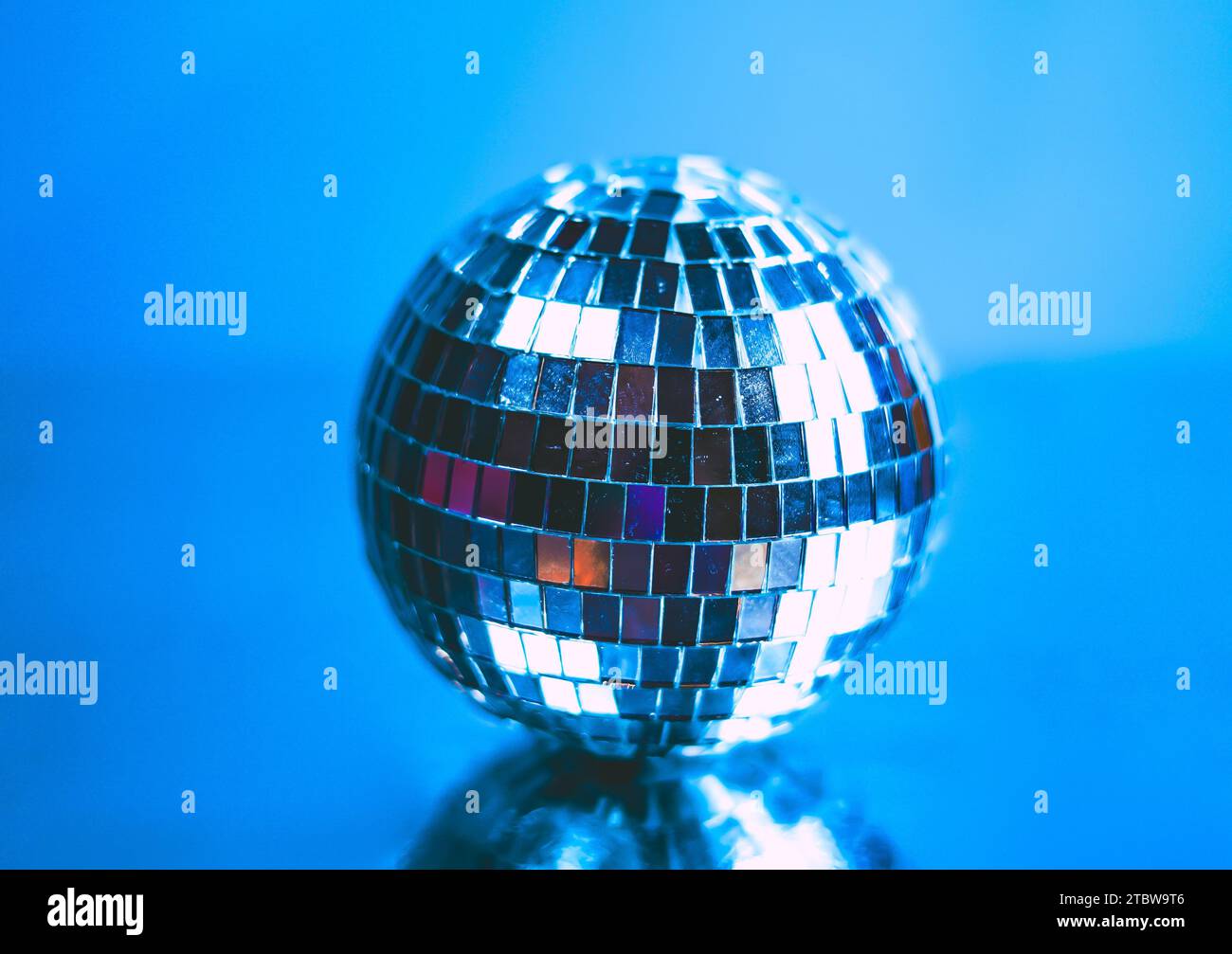 Silver disco ball as a background Stock Photo - Alamy
