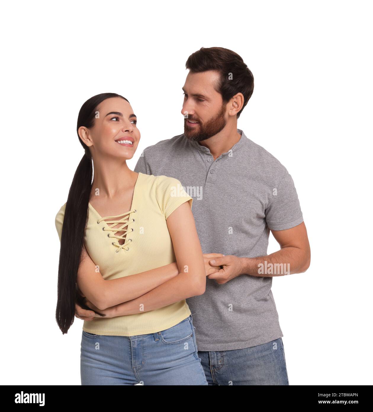 Happy couple dancing together on white background Stock Photo - Alamy