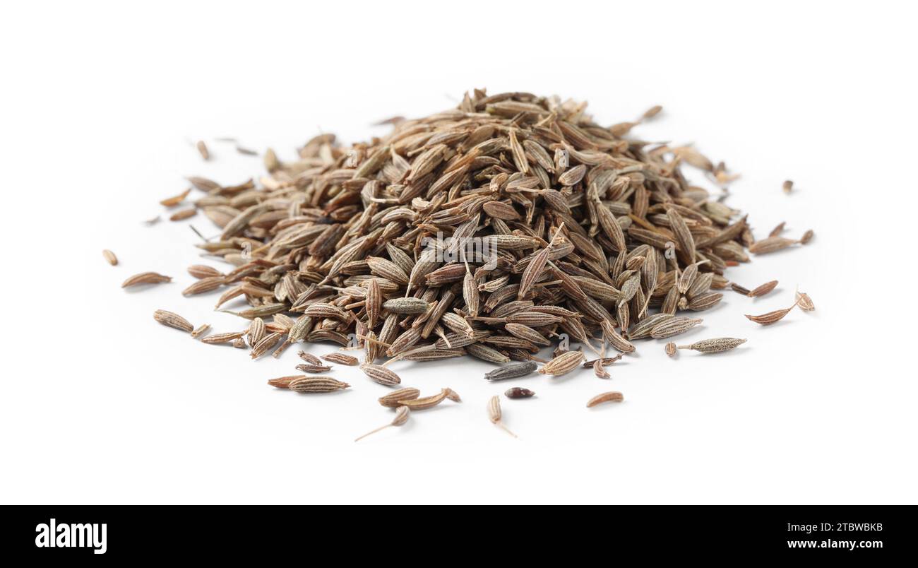 Heap of aromatic caraway (Persian cumin) seeds isolated on white Stock ...