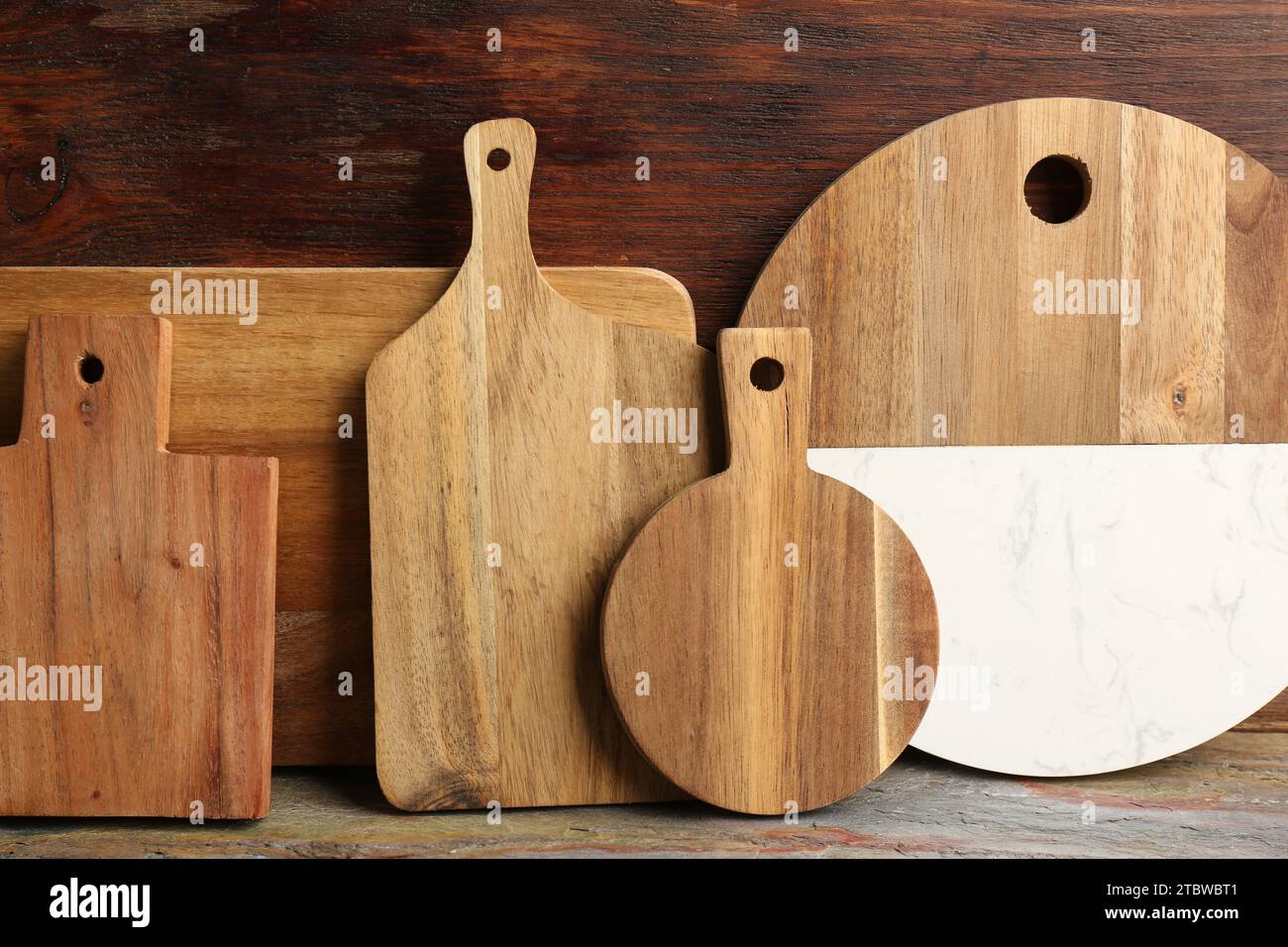 Set of different cutting boards on table Stock Photo - Alamy