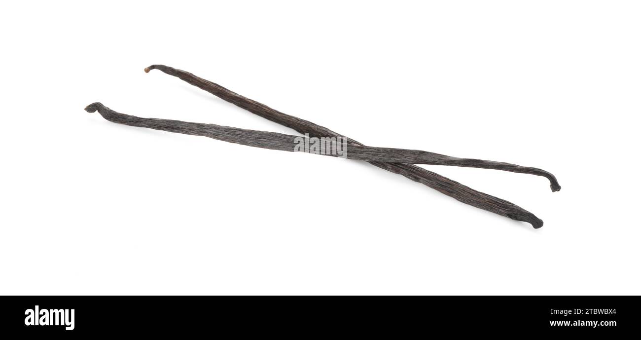 Two aromatic vanilla pods isolated on white Stock Photo - Alamy